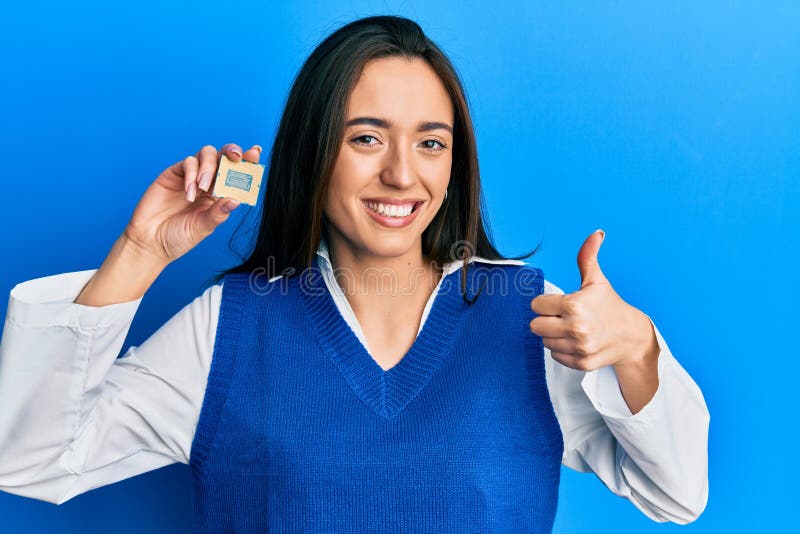 Young Hispanic Girl Holding Cpu Computer Processor Smiling Happy and ...