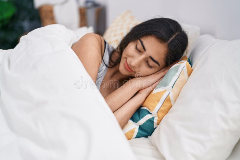Young Hispanic Girl Lying on Bed Sleeping at Bedroom Stock Image ...