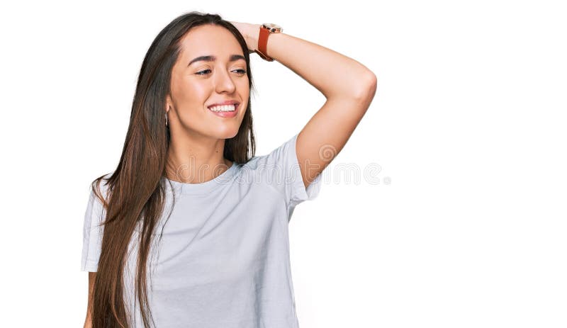 Young Hispanic Girl Wearing Casual White T Shirt Smiling Confident