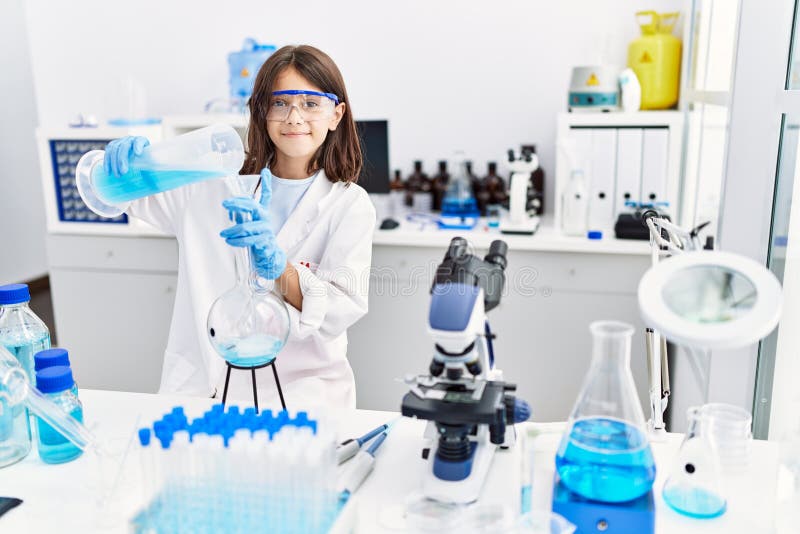 Young Hispanic Girl Working at Laboratory Stock Image - Image of ...