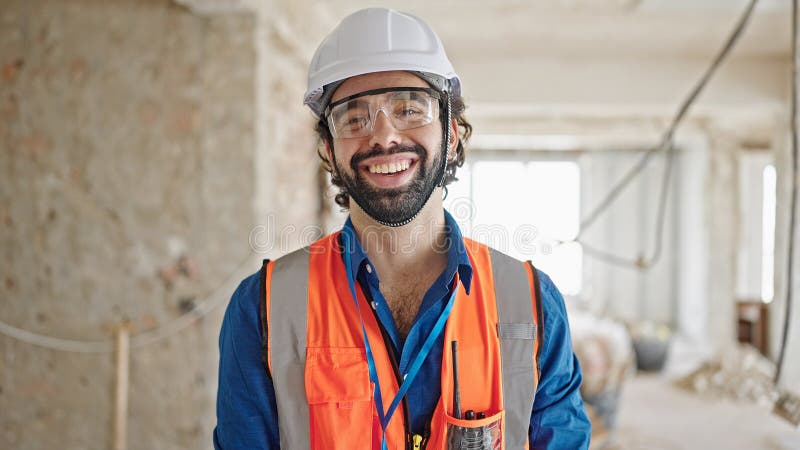 Young Hispanic Man Architect Smiling Confident Standing at Construction ...