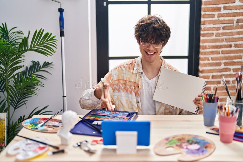 Young Hispanic Man Artist Having Online Drawing Class at Art Studio ...