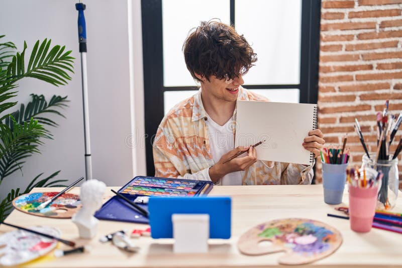 Young Hispanic Man Artist Having Online Drawing Class at Art Studio ...