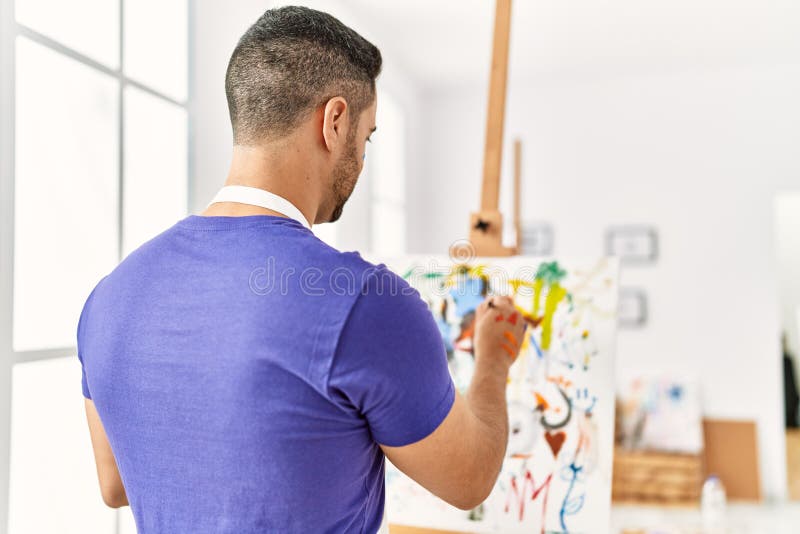 Young Hispanic Man on Back View Drawing at Art Studio Stock Image ...