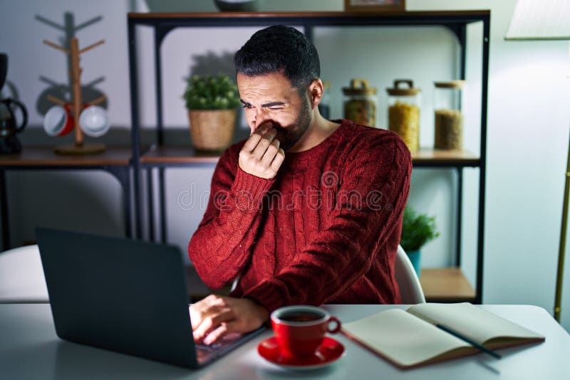 Young Hispanic Man with Beard Using Computer Laptop at Night at Home ...