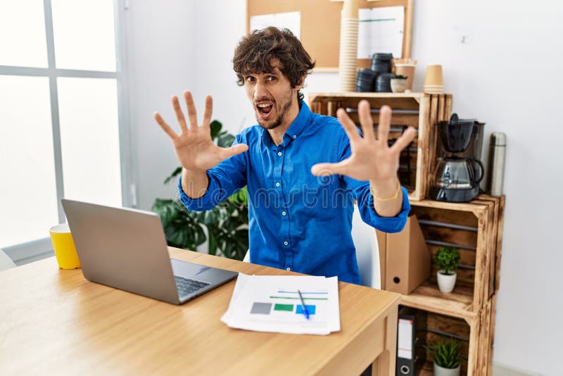 Young Hispanic Man with Beard Working at the Office Using Computer ...