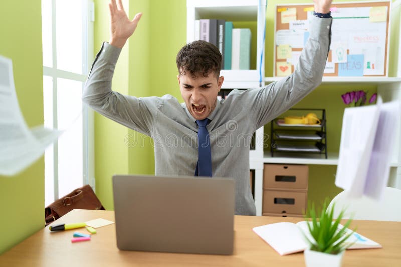 Young Hispanic Man Business Worker Angry Throwing Documents Screaming ...