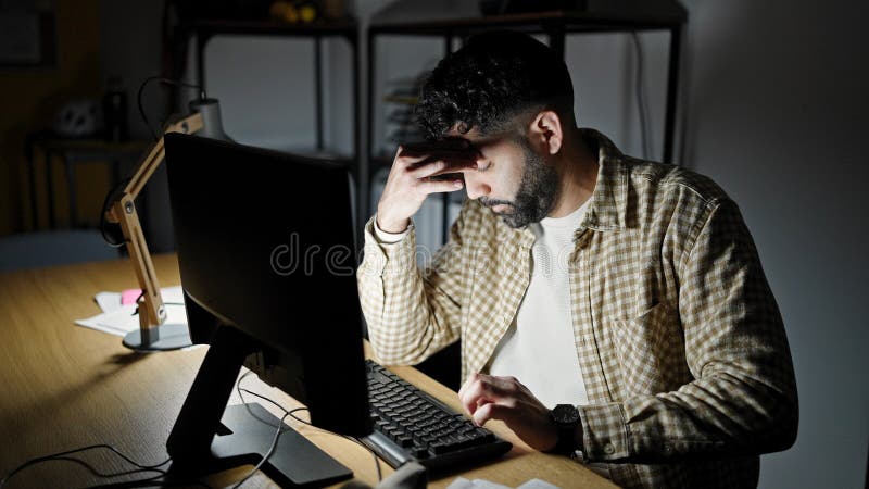 Young Hispanic Man Business Worker Using Computer Stressed at Office ...