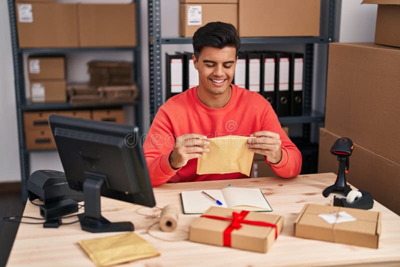 Young Hispanic Man Ecommerce Business Worker Closing Package at Office ...