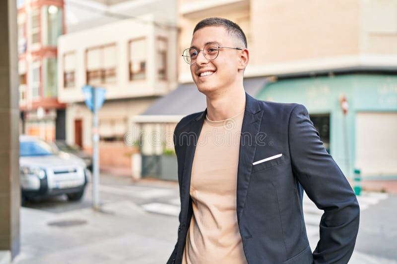 Young Hispanic Man Executive Smiling Confident Standing at Street Stock ...