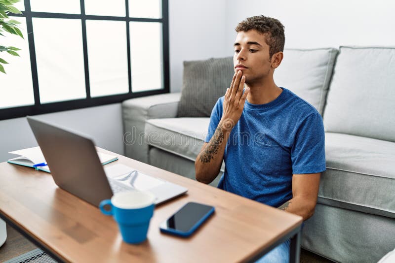 Young Hispanic Man Gesturing Sign Language on Video Call at Home Stock ...