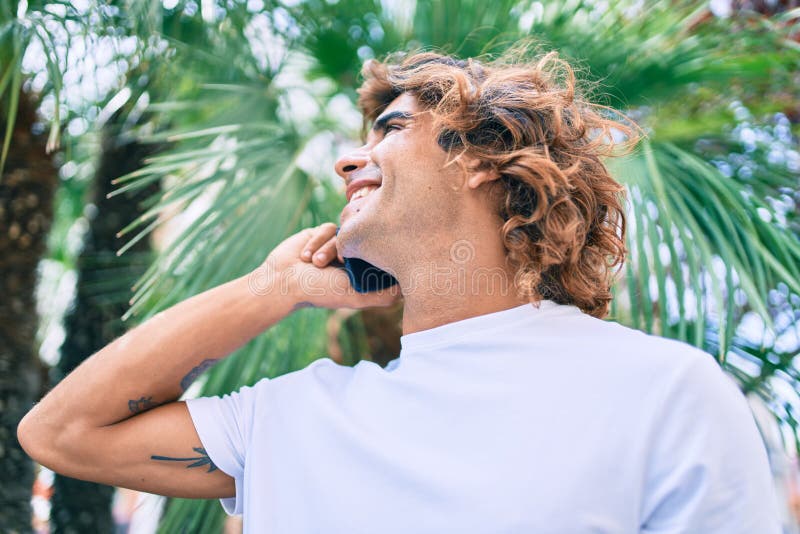 Young Hispanic Man Having Conversation Talking on the Smartphone at ...