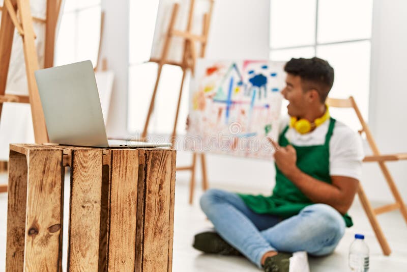 Young Hispanic Man Smiling Confident Having Online Draw Class at Art ...