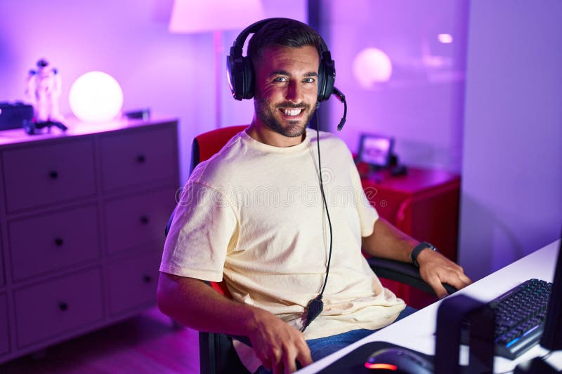Young Hispanic Man Streamer Smiling Confident Sitting on Table at ...