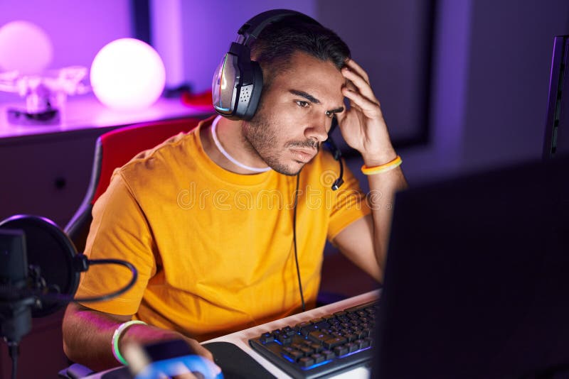 Young Hispanic Man Streamer Stressed Using Computer at Gaming Room ...