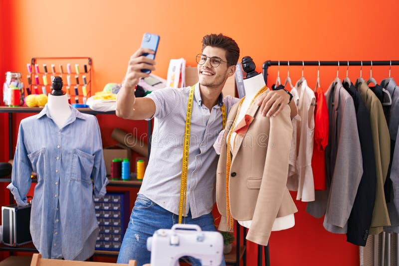 Young Hispanic Man Tailor Make Selfie by Smartphone Hugging Manikin at ...