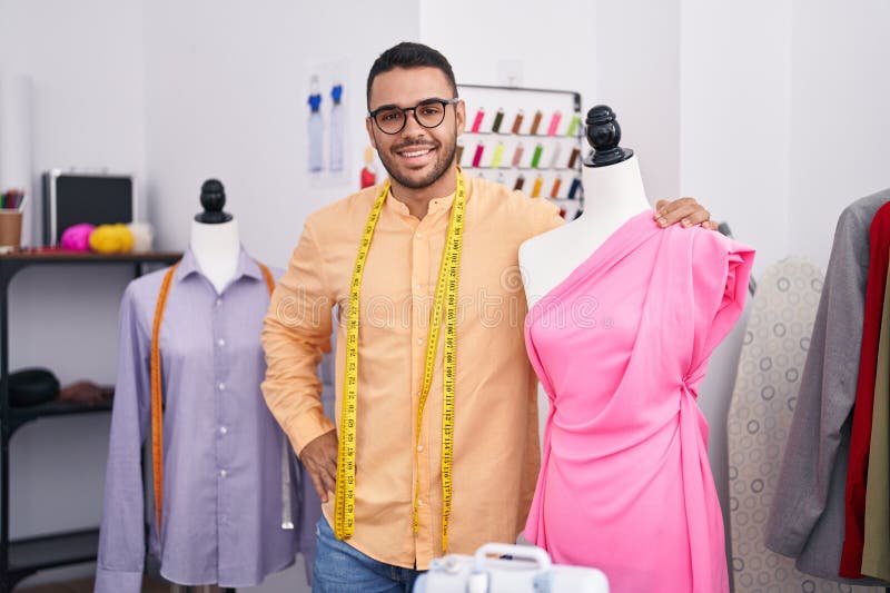 Young Hispanic Man Tailor Smiling Confident Leaning on Manikin at ...