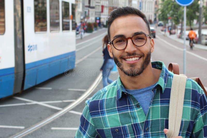 Young Hispanic Man Using Public Transportation Stock Photo - Image of ...