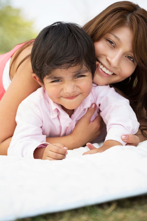 Hispanic Mom Kissing Her New Born Baby. Stock Photo - Image of parent ...