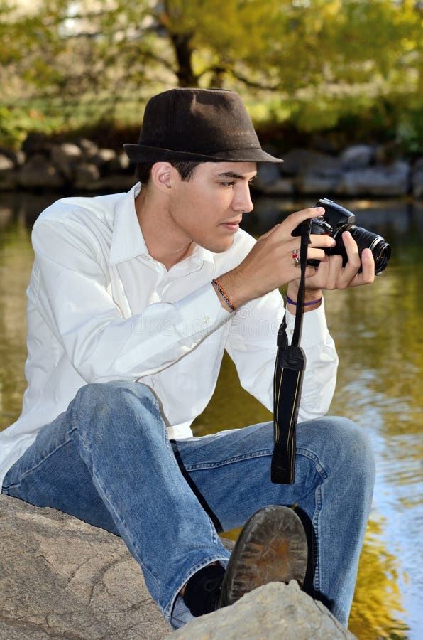 Young Hispanic Photographer Stock Image - Image of active, countryside ...