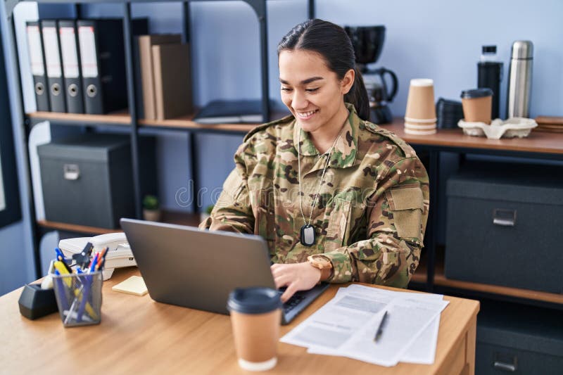 Young Hispanic Woman Army Soldier Using Laptop at Office Stock Photo ...