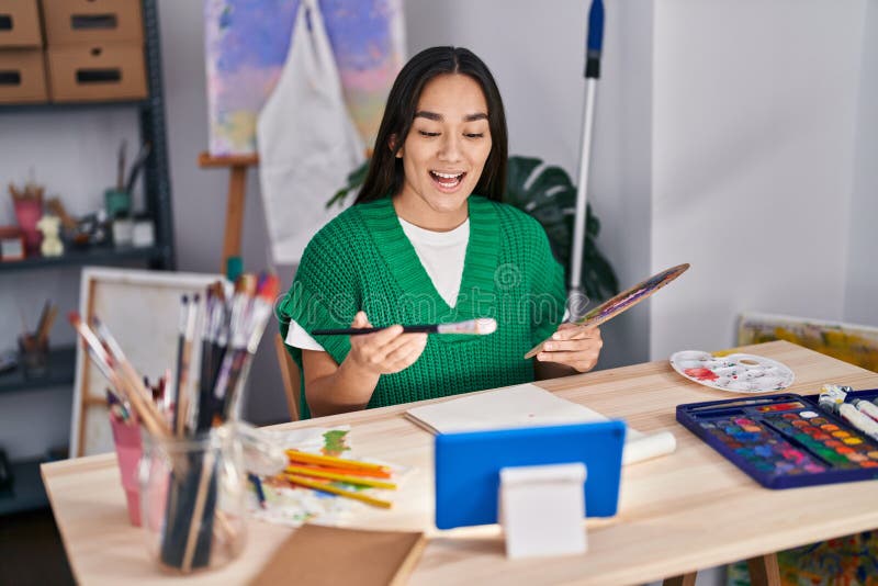 Young Hispanic Woman Artist Having Online Drawing Class at Art Studio ...