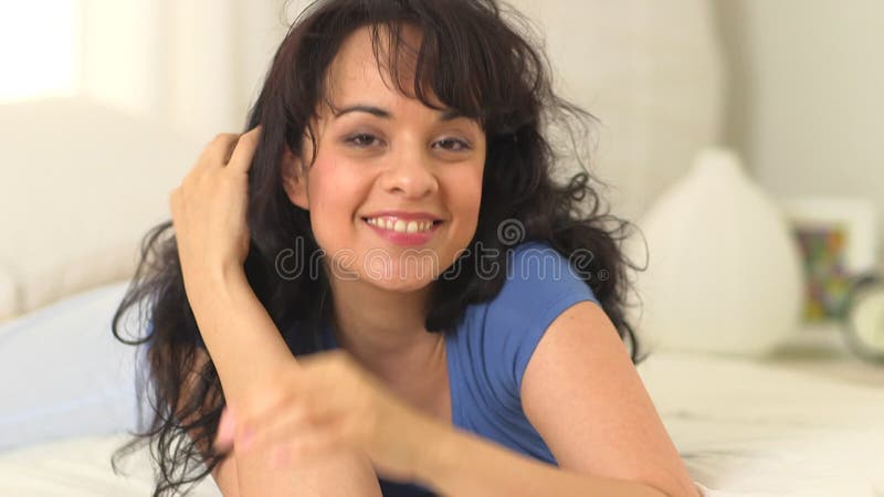 Young Hispanic Woman on Bed Stock Video - Video of lying, home: 257830013