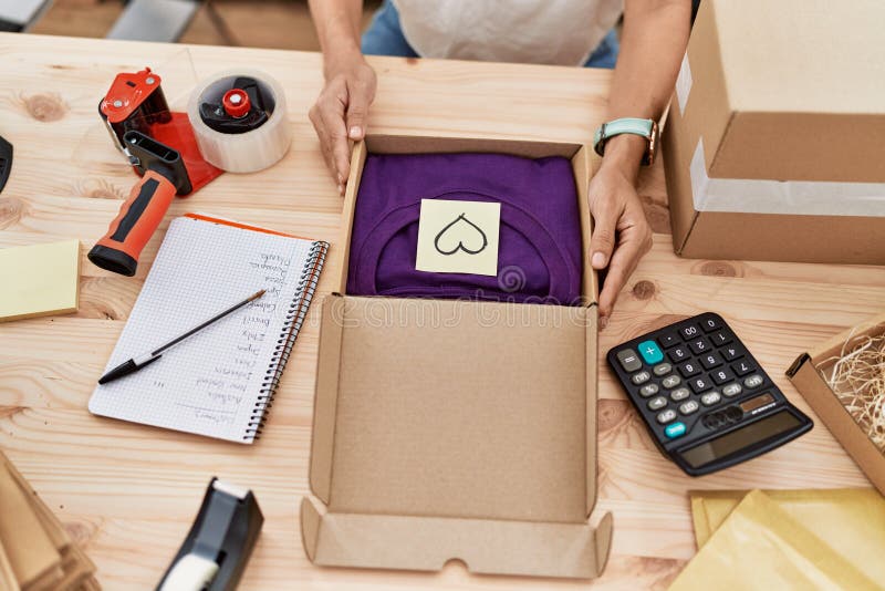 Young Hispanic Woman Packing Order at Store Stock Image - Image of ...