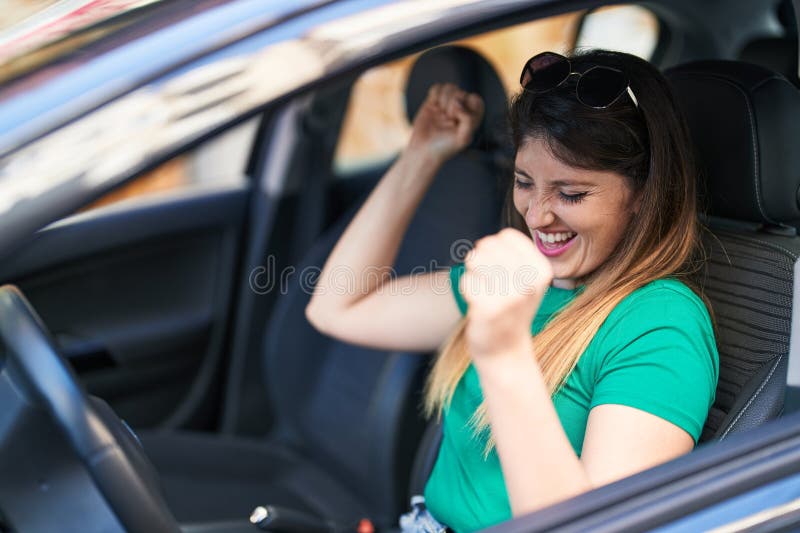 Young Hispanic Woman Sitting on Car Dancing at Street Stock Image ...