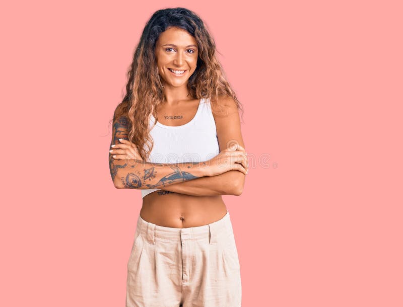 Young Hispanic Woman With Tattoo Wearing Casual Clothes Happy Face