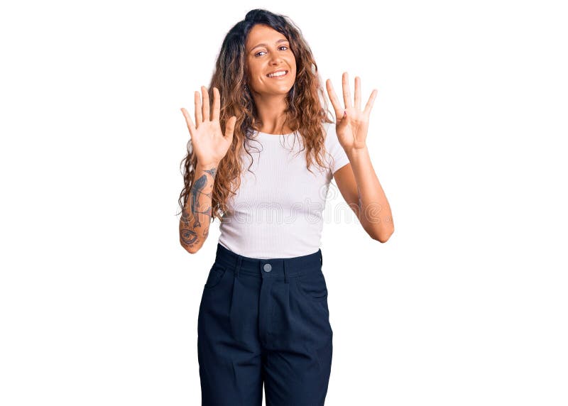 Young Hispanic Woman With Tattoo Wearing Casual White Tshirt Showing