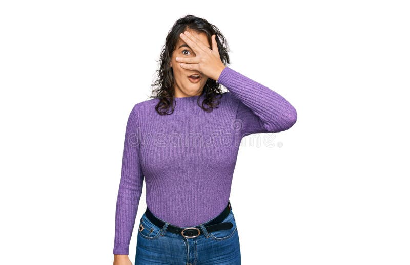 Young Hispanic Woman Wearing Casual Clothes Peeking In Shock Covering