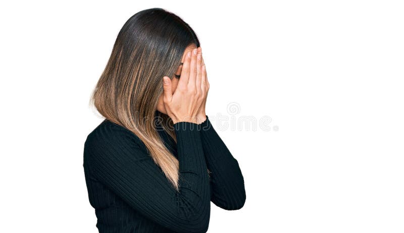 Young Hispanic Woman Wearing Casual Clothes With Sad Expression
