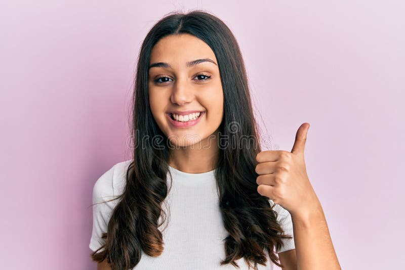 Young Hispanic Woman Wearing Casual White T Shirt Smiling Happy And