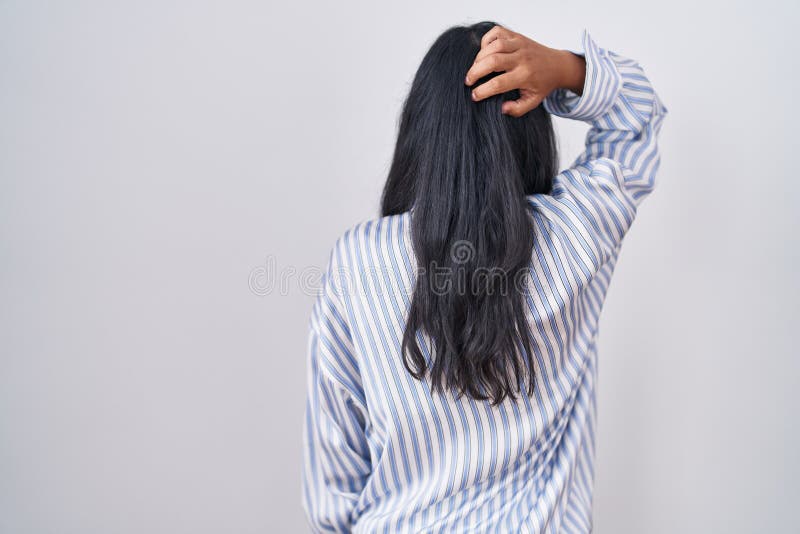 Young Hispanic Woman Wearing Glasses Backwards Thinking about Doubt ...