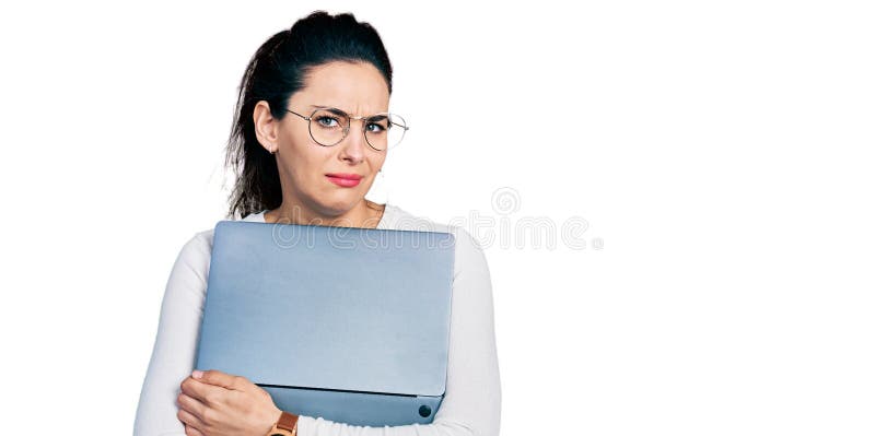 Young Hispanic Woman Working Using Computer Laptop Clueless and ...