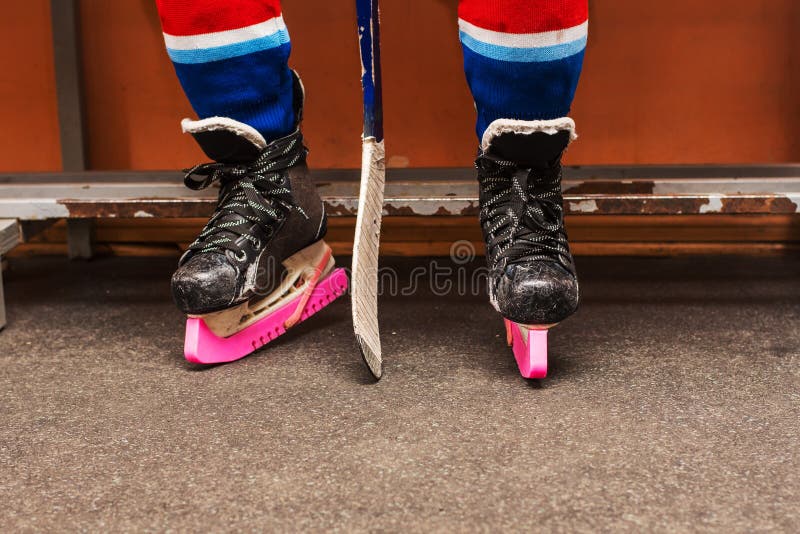 Young Hockey Player Sitting on a Bench Stock Image - Image of player ...