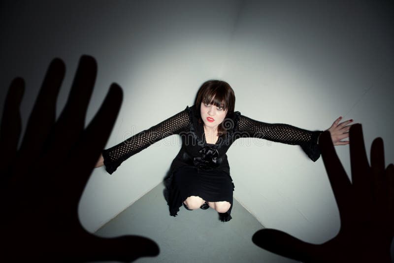 Goth Girl Cowering in Corner Stock Photo - Image of cowering, unhappy ...