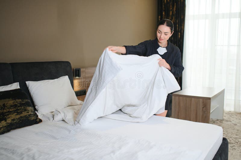 Young Hotel Maid Making the Bed Stock Image - Image of girl, making ...