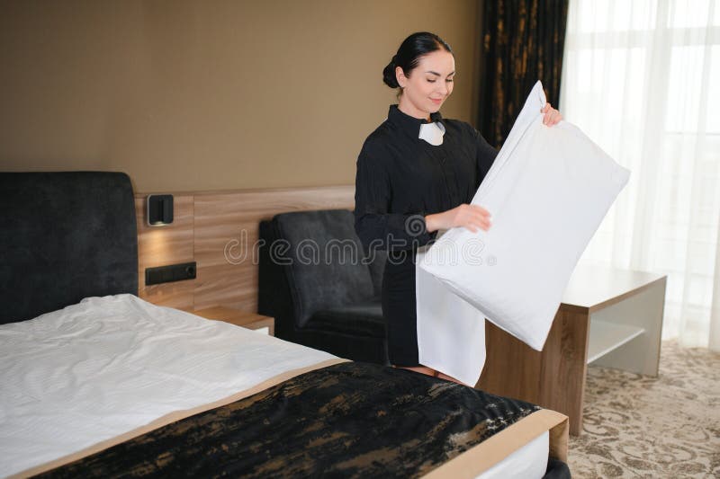 Young Hotel Maid Making the Bed Stock Photo - Image of person ...