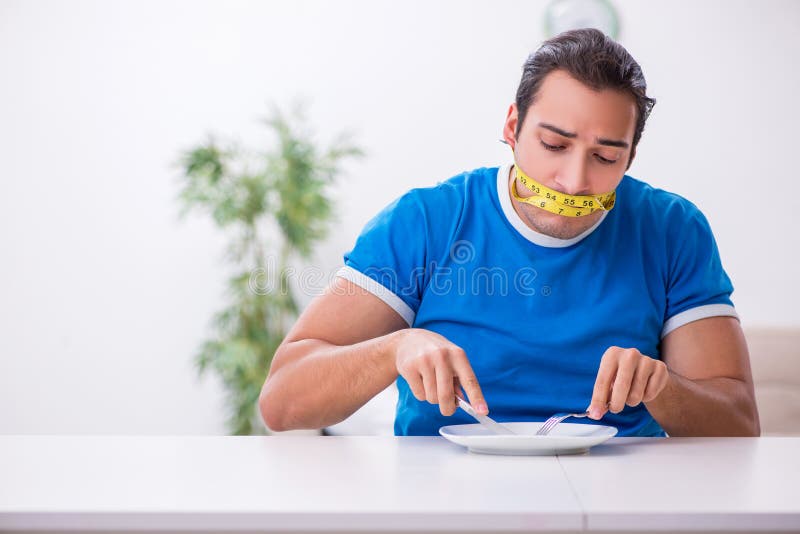 Young Hungry Man in Dieting Concept Stock Image - Image of dietary ...