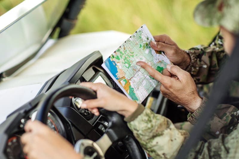 Young Hunters Determine the Route Map and Navigator Stock Image - Image ...