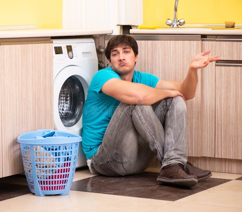 Young Husband Man Doing Laundry at Home Stock Photo - Image of cleaner ...