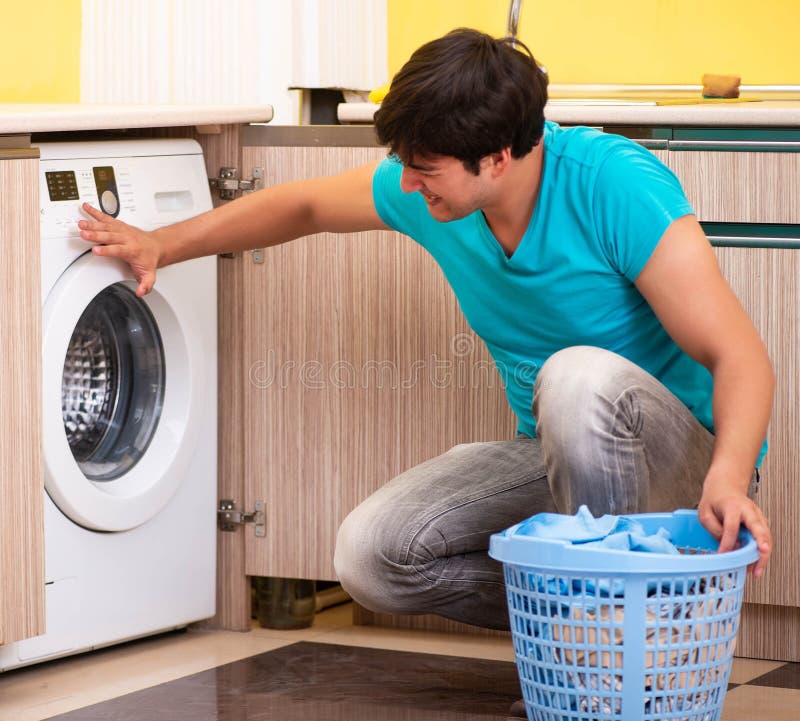 Young Husband Man Doing Laundry at Home Stock Image - Image of ...