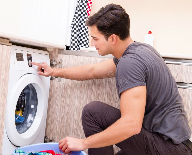 Young Husband Man Doing Laundry at Home Stock Image - Image of ...