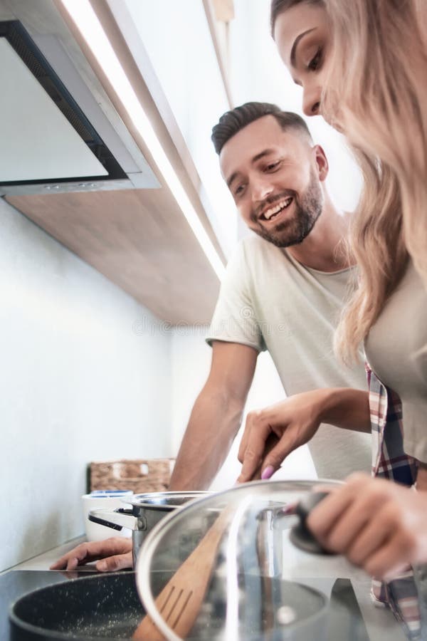 Young Husband and Wife Cook Dinner Together Stock Photo - Image of male ...