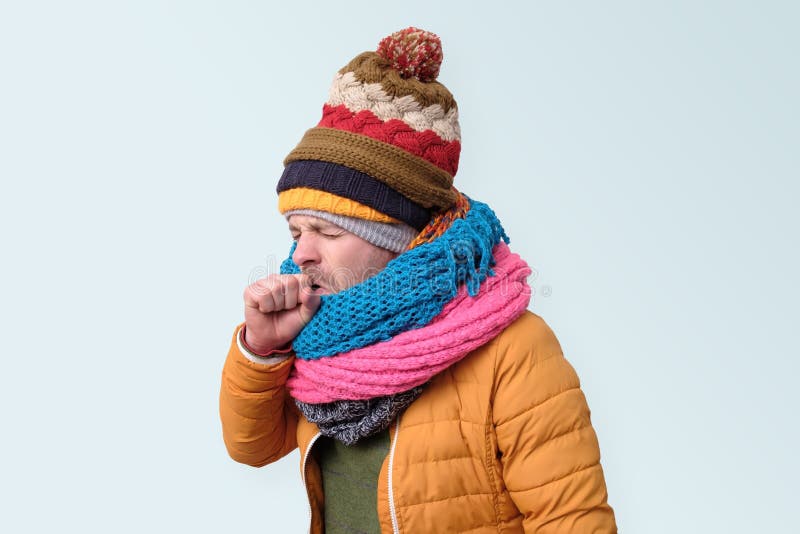 Young Ill Man in Winter Hat and Scarf Coughing Being Sick. Stock Photo ...