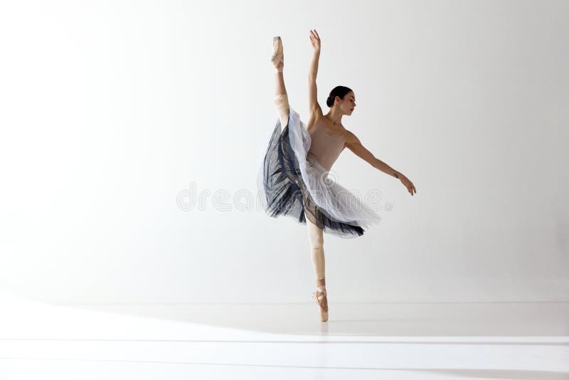 Young and Incredibly Beautiful Ballerina is Posing and Dancing in a ...