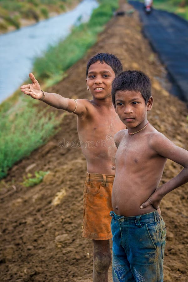 Indian Boys Swimming in the Sacred Water of the River Ganges in the ...