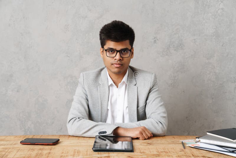 Young Indian Businessman Using Tablet Computer in Office Stock Image ...